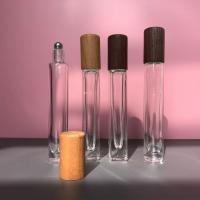 China Advanced Perfume Essential Oil Ball Bottle 10ML Wood Cap Ball for sale