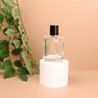 China Portable Perfume Sub Bottled 30ML Spray 50ML Pressed Glass for sale