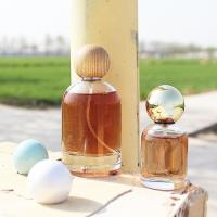 China Transparent Perfume Glass Spray Bottle 30ML 50ML 100ML Empty With Ball Cap for sale