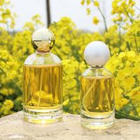 China Transparent Perfume Glass Spray Bottle 30ML 50ML 100ML Empty With Ball Cap for sale