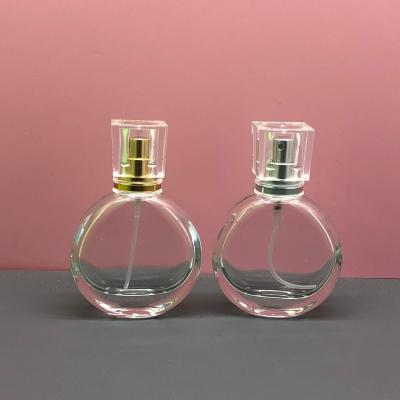 China Glass Portable Perfume Spray Bottle 25ML Flat Round Refillable 1000 Pcs for sale