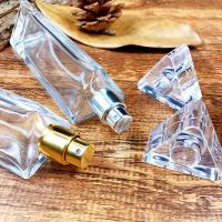 China Triangular Spot Perfume Glass Spray Bottle 30ml Transparent Empty 50ml for sale
