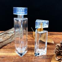 China Triangular Spot Perfume Glass Spray Bottle 30ml Transparent Empty 50ml for sale