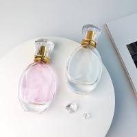 China Glass Oval Perfume Spray Atomizer Bottle 50ml Transparent for sale