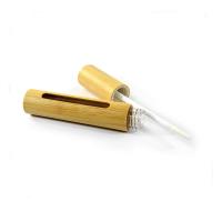 China Wood Color Engraved Bamboo Engraved Empty Lip Gloss Tubes 5ml 6ml 7ml for sale