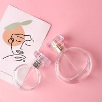 China OEM 50ml 20 ml Perfume Spray Bottle  portable perfume bottle flat round glass for sale