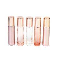 China 5ml 10ml Round Glass Essential Oil Bottle Pink Roller Roll With Aluminum Cap for sale