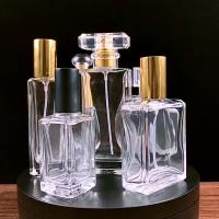 China Clear Blue Green OEM 30ml 50ml Glass Perfume Spray Bottle 0.3kg for sale