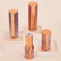 China Bow tie shape golden diamond Empty Lipstick Tube pearl frosted gradient color for sale