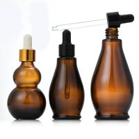 China Dropper 10ml Gourd Shape Amber Glass Roll On Bottles Silk Printing for sale