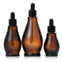 China Dropper 10ml Gourd Shape Amber Glass Roll On Bottles Silk Printing for sale