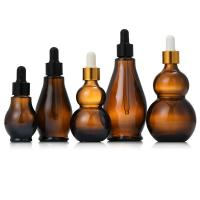 China Dropper 10ml Gourd Shape Amber Glass Roll On Bottles Silk Printing for sale
