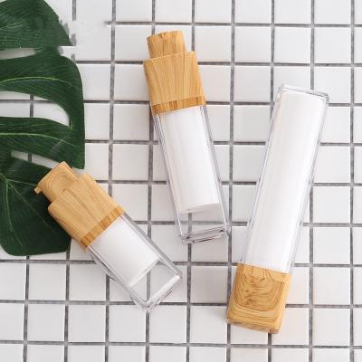 China Plastic AS White 15ml 30ml 50ml Lotion Pump Bottle With Wooden  Cap for sale