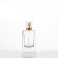 China Frost Matte 100ml Round Perfume Perfume Spray Bottle With Acrylic Cap for sale