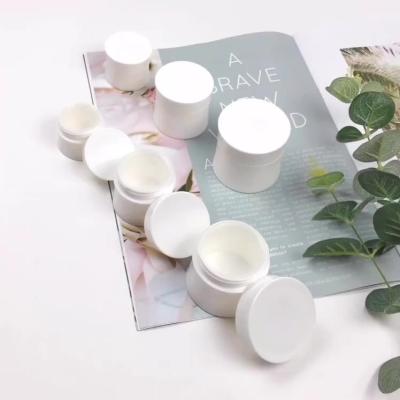 China Wholesale Custom Logo Plastic Cosmetic Jar15g 30g 50g Cream Empty White Cylinder for sale