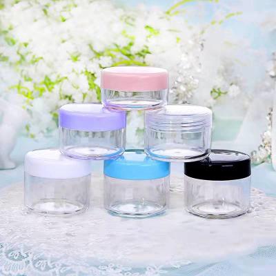 China Sub-Packaging Small Round 50g Plastic Cosmetic Jar Travel Sub-Bottling Cream Jar for sale