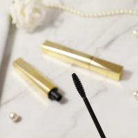 China 8.5ml Gold Plastic Mascara Tube Plated Gold Square Empty Mascara Container for sale
