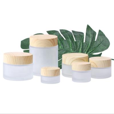 China MSDS Frosted Cosmetic Cream Jars With Bamboo Lids 10ml 15ml 20ml for sale