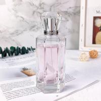China Special Shaped Transparent Glass 100ml Perfume Spray Bottle With Cap for sale