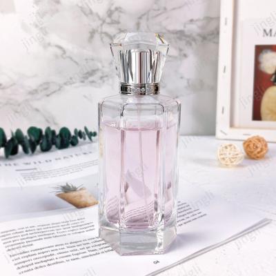 China Special Shaped Transparent Glass 100ml Perfume Spray Bottle With Cap for sale