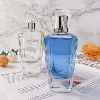 China Special Shaped Transparent Glass 100ml Perfume Spray Bottle With Cap for sale