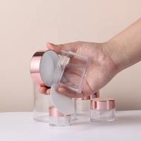 China Small 60ml 120ml 250ml Plastic Cosmetic Jars With Pink Gold Screw Lids for sale