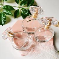 China New Fashion Clear 30ml 50ml Glass Round Screw Mouth Perfume Spray Bottle for sale