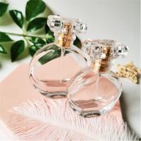 China New Fashion Clear 30ml 50ml Glass Round Screw Mouth Perfume Spray Bottle for sale