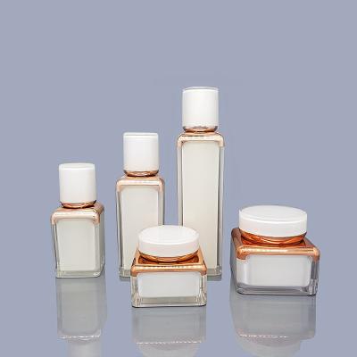 China Fancy Gold Skin Care Square Cosmetic Jars Airless Lotion Bottle OEM for sale
