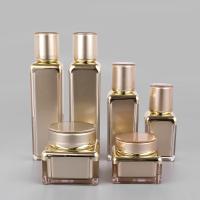 China Fancy Gold Skin Care Square Cosmetic Jars Airless Lotion Bottle OEM for sale
