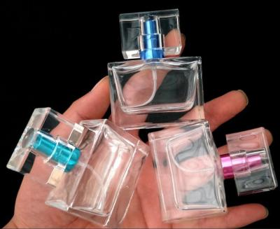 China 30ml Flat Square Design Perfume Spray Bottle Empty Glass Luxury Perfume Bottles for sale