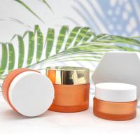 China Gold Amber Cream Frosted Plastic Jars With Aluminium Anodized Caps for sale