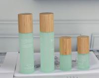 China Glass Frosted Bamboo Lotion Pump Bottle 30ml 50ml 60ml for sale