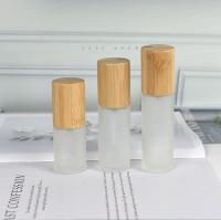 China Glass Frosted Bamboo Lotion Pump Bottle 30ml 50ml 60ml for sale