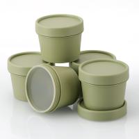 China OEM Green PP Plastic Cosmetic Packaging Cream Jars 100g for sale