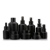 China Cosmetic Packaging Black Glass Spray Bottles 15ml 30ml 125ml for sale