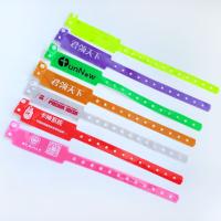 China Neon Color PVC Reflective Wristbands 250x25mm Wide Shape Disposable Plastic Lock Custom ID Event Party for sale