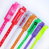 China Neon Color PVC Reflective Wristbands 250x25mm Wide Shape Disposable Plastic Lock Custom ID Event Party for sale