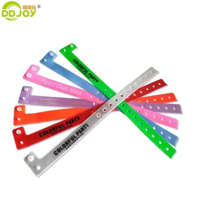China Custom Logo Reflective Neon Green L Shape PVC Party Wristband 250x16mm Waterproof for sale