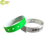 China Custom Logo Reflective Neon Green L Shape PVC Party Wristband 250x16mm Waterproof for sale