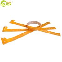 China Custom Logo Reflective Neon Green L Shape PVC Party Wristband 250x16mm Waterproof for sale