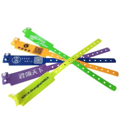 China Custom Neon PVC Wristbands 250x25mm Waterproof Festival Vinyl Bracelet for sale
