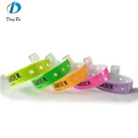 China Custom Logo Printed Vinyl Wristband 250mm x 25mm Plastic Festival Bracelet for Parks for sale