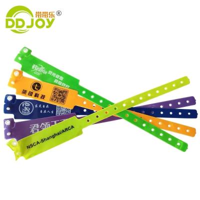 China Custom Neon PVC Wristband Two Color Printing 250x25mm Adjustable Waterproof for Events for sale