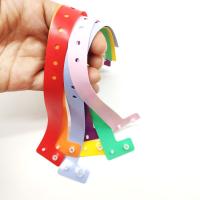 China Custom Logo PVC L Shape Adjustable Plastic Bracelet 250x16mm for Event Festival for sale