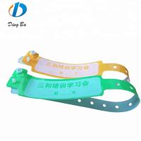 China Custom Neon Color PVC Wristband 250mm x 25mm Waterproof Plastic Bracelet for Hotel Identification for sale