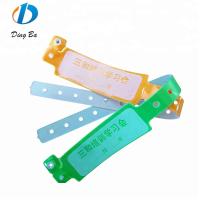 China Custom Neon Color PVC Wristband 250mm x 25mm Waterproof Plastic Bracelet for Hotel Identification for sale