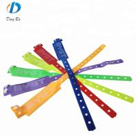 China Custom Neon Color PVC Wristband 250mm x 25mm Waterproof Plastic Bracelet for Hotel Identification for sale