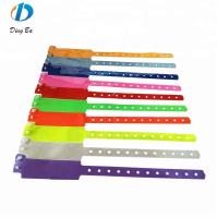 China Custom Neon Color PVC Wristband 250mm x 25mm Waterproof Plastic Bracelet for Hotel Identification for sale