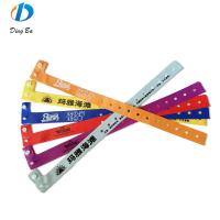 China Custom Logo Orange PVC Wristbands 250x25mm for Events Festival Disposable Waterproof for sale